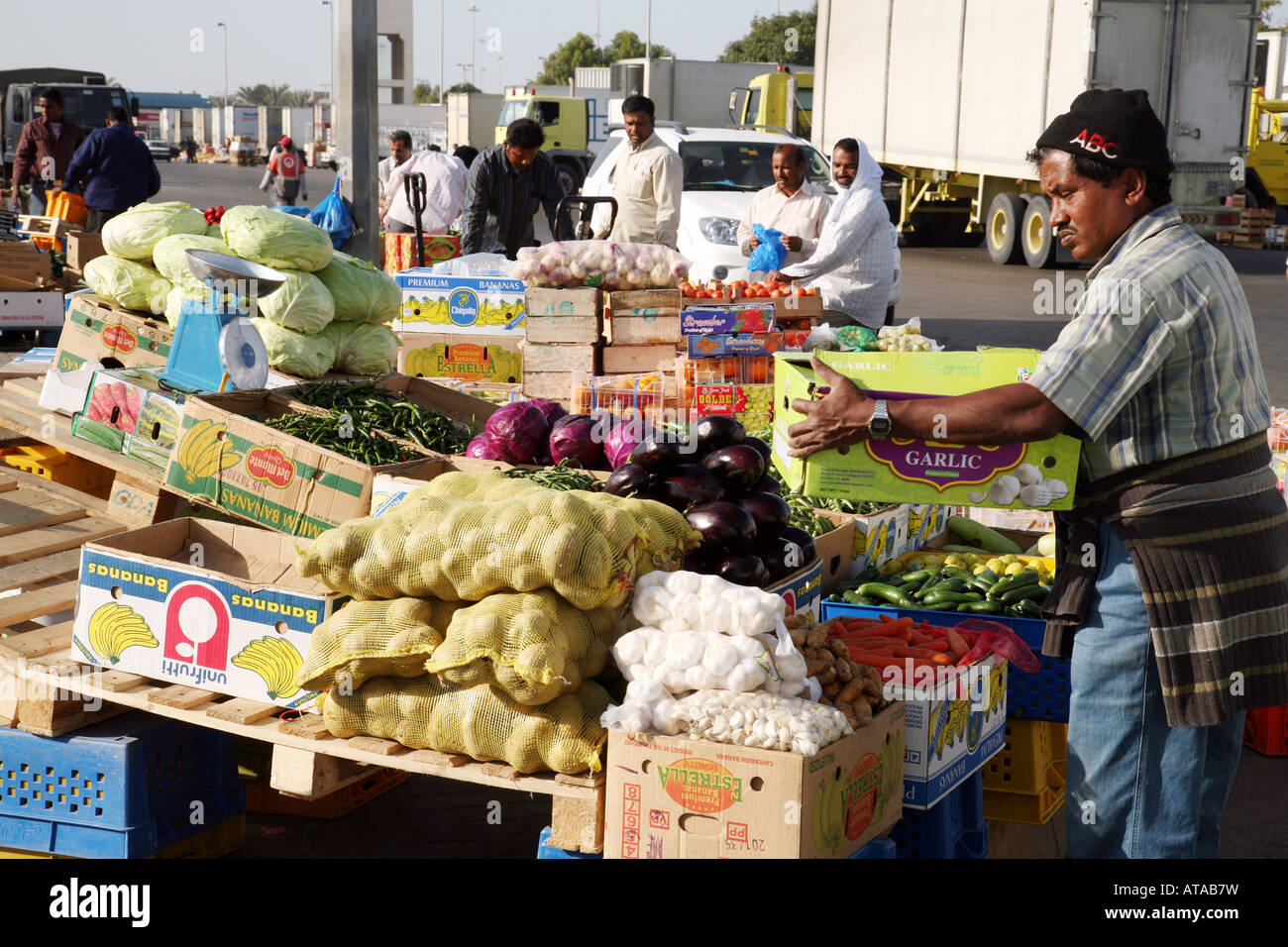 Stall keeper, Fruit and veg market, Abu Dhabi Stock Photo - Alamy