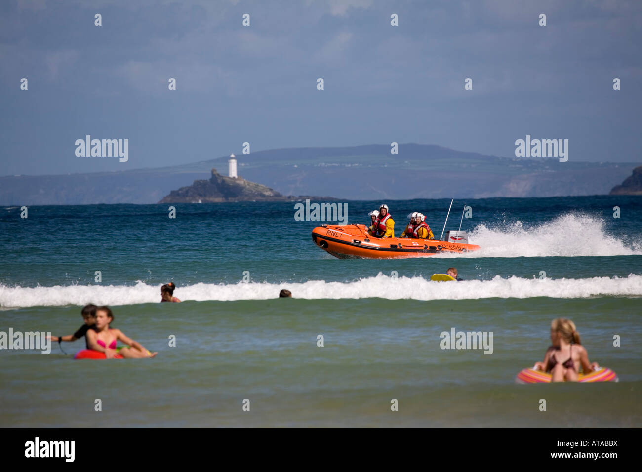 st ives bay with lifeboat in front of Godrevy lighthouse Stock Photo ...