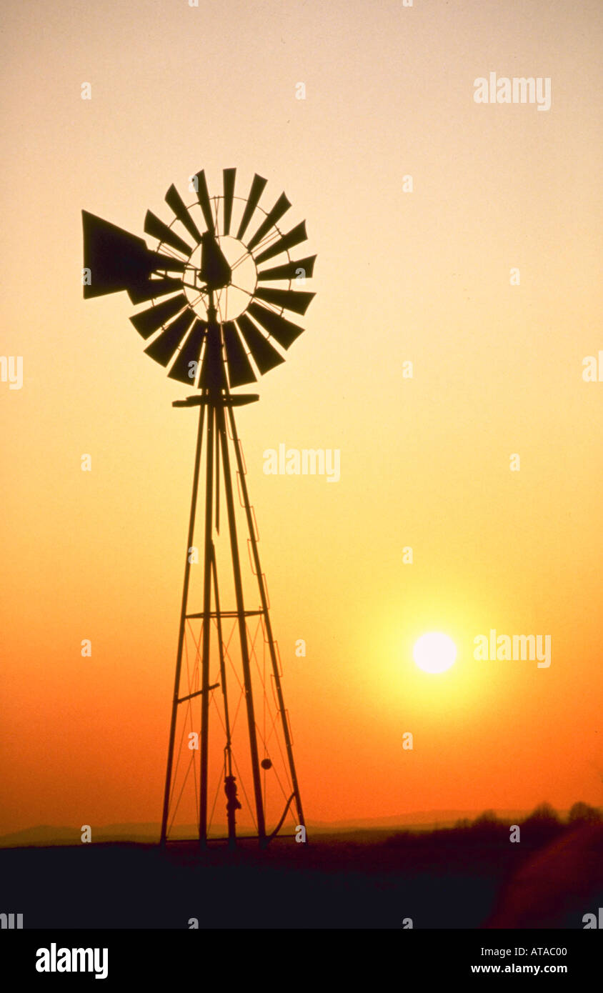 Windmill at sunset Stock Photo - Alamy