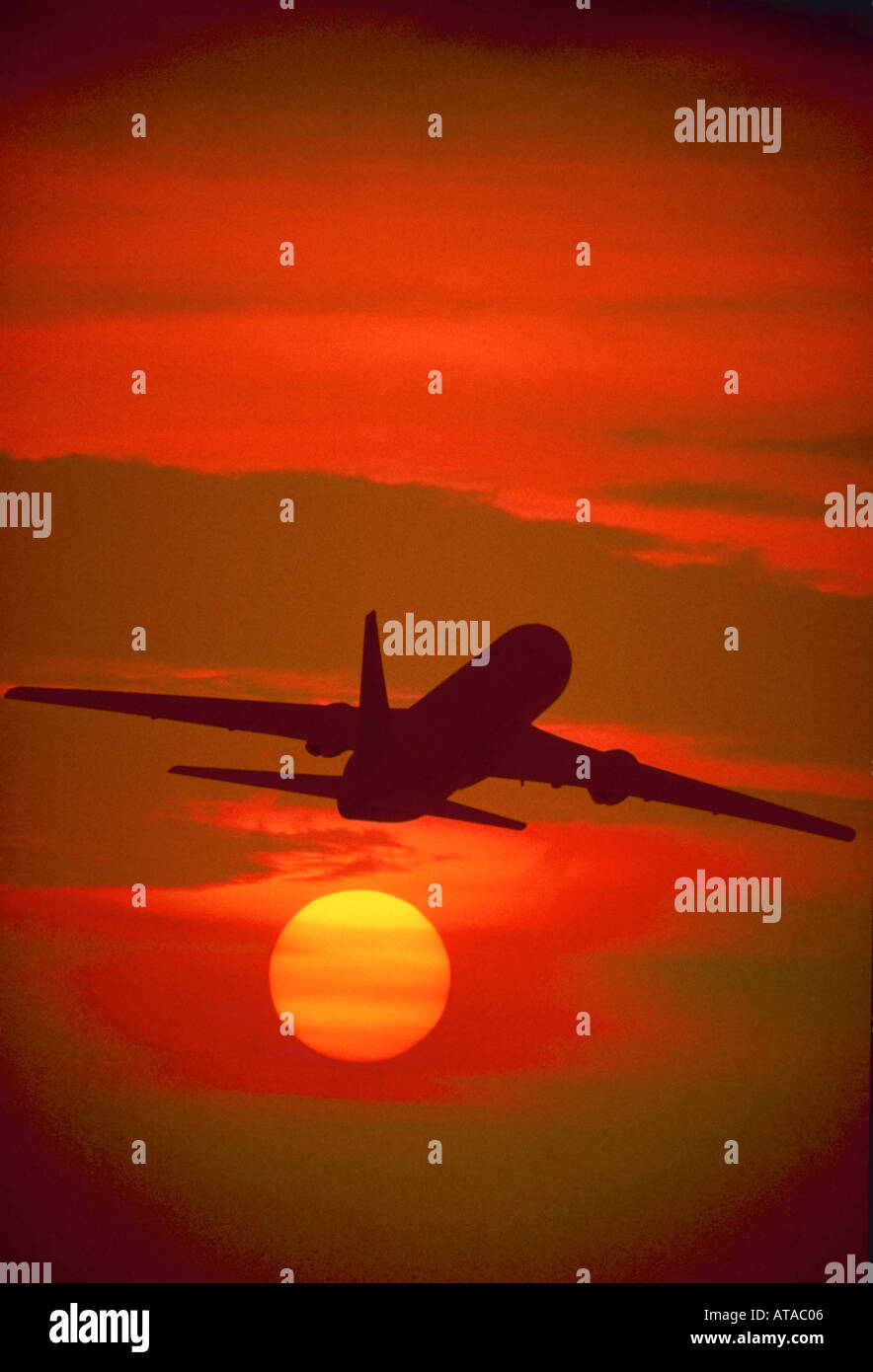 Boeing 767 airliner taking off into sunset Computer montage Stock Photo ...