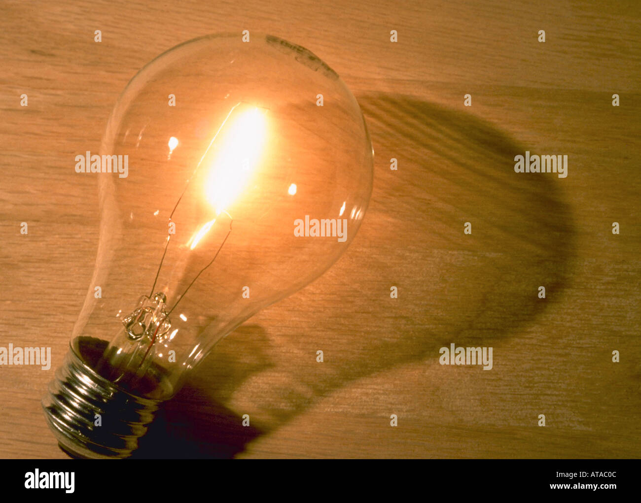 Still life of glowing lightbulb Stock Photo - Alamy