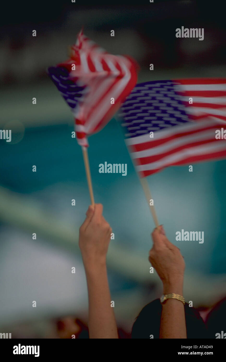 Hands waving American flags Stock Photo - Alamy