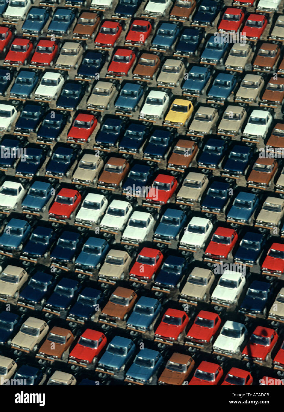 Cars lined up for shipment squeezed computer generated Stock Photo - Alamy