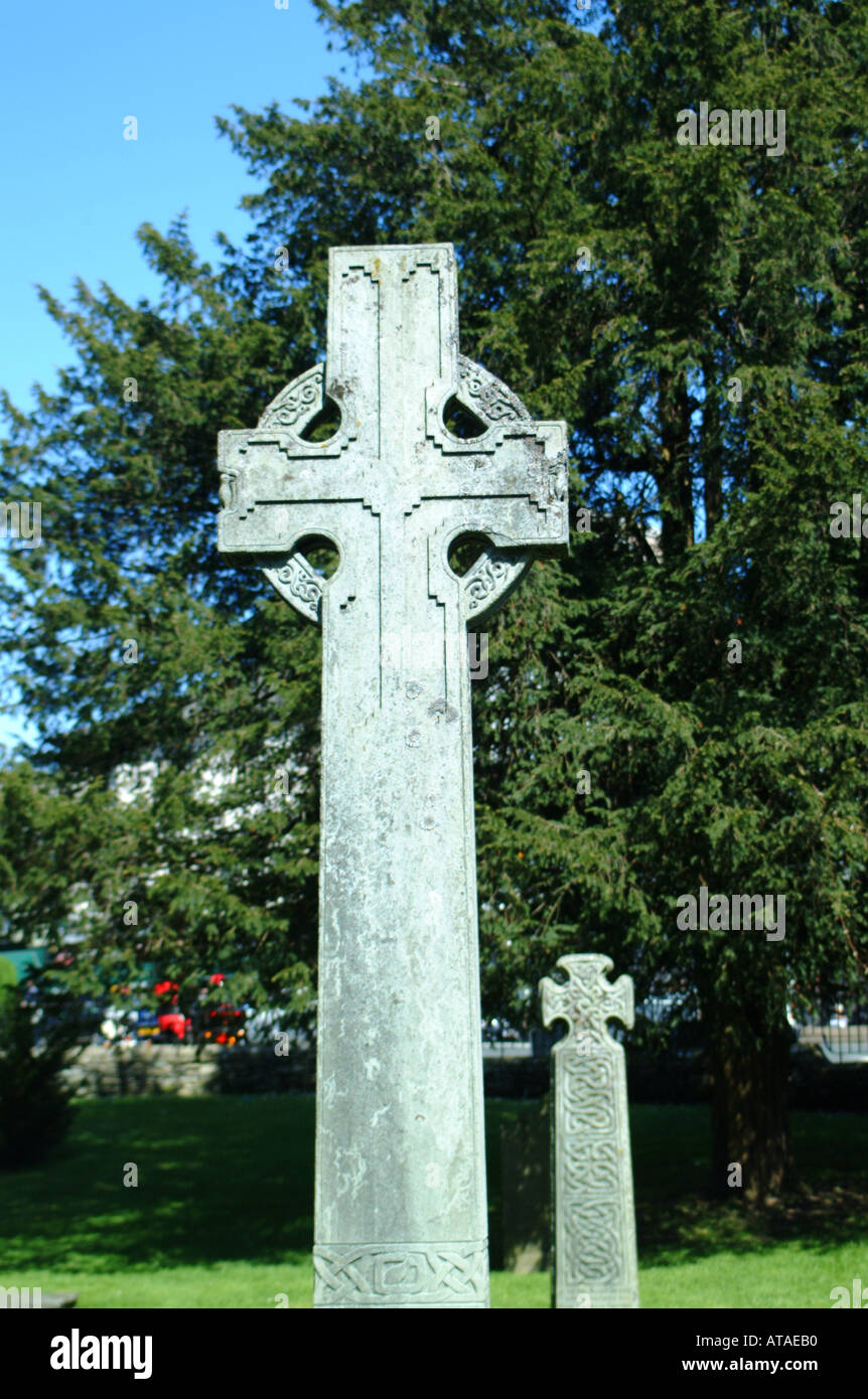 a celtic cross in a churchyard Stock Photo - Alamy