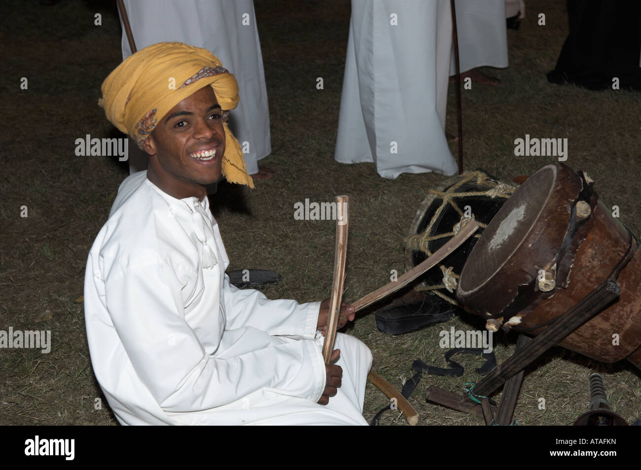 Omani man playing drum at Muscat festival Oman Stock Photo - Alamy