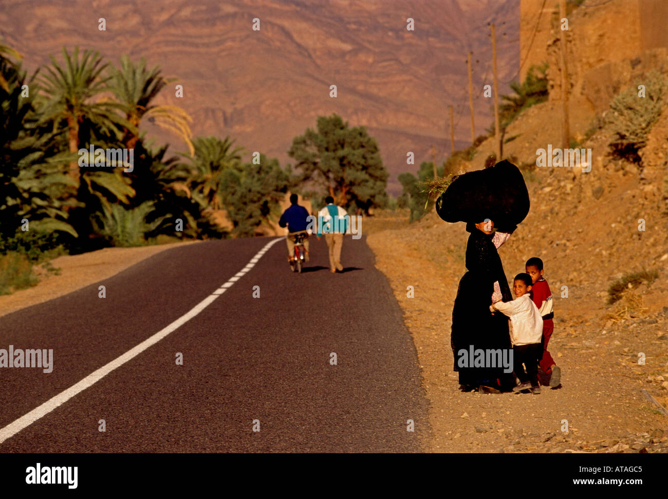 Moroccans, Moroccan woman, Moroccan boys, mother and children, walking ...