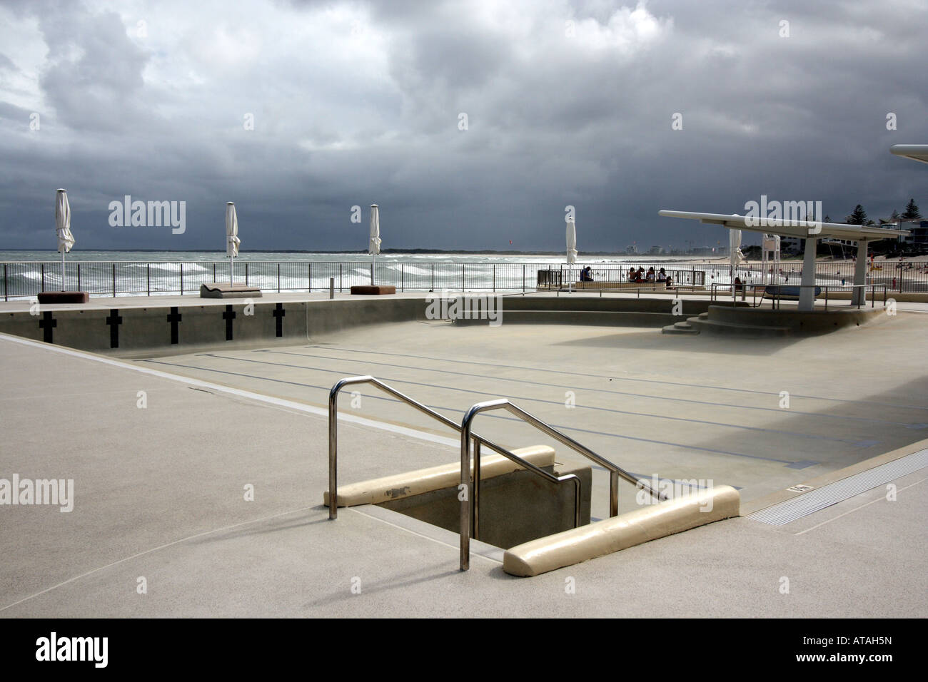 EMPTY PUBLIC SWIMMING POOL WITH STORMY SKY BACKGROUND HORIZONTAL ...
