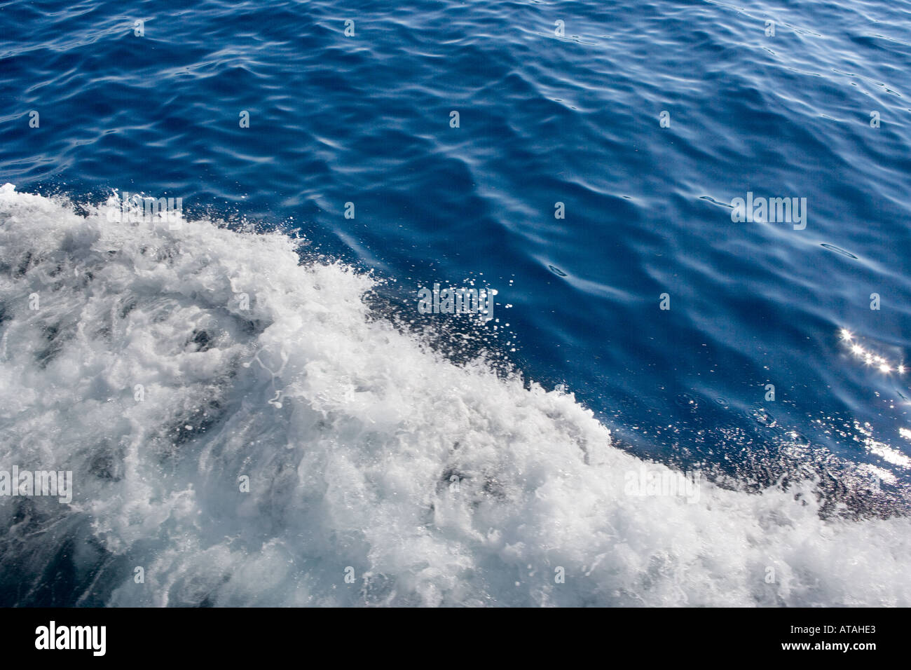 Sea wash from a moving boat Stock Photo - Alamy