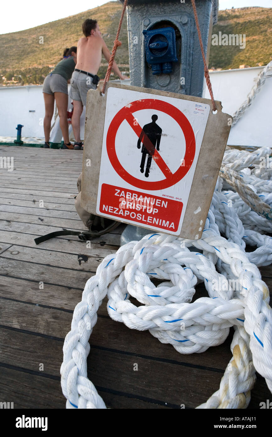 Man woman no entry sign ferry summer warning rope croatia hi-res stock ...