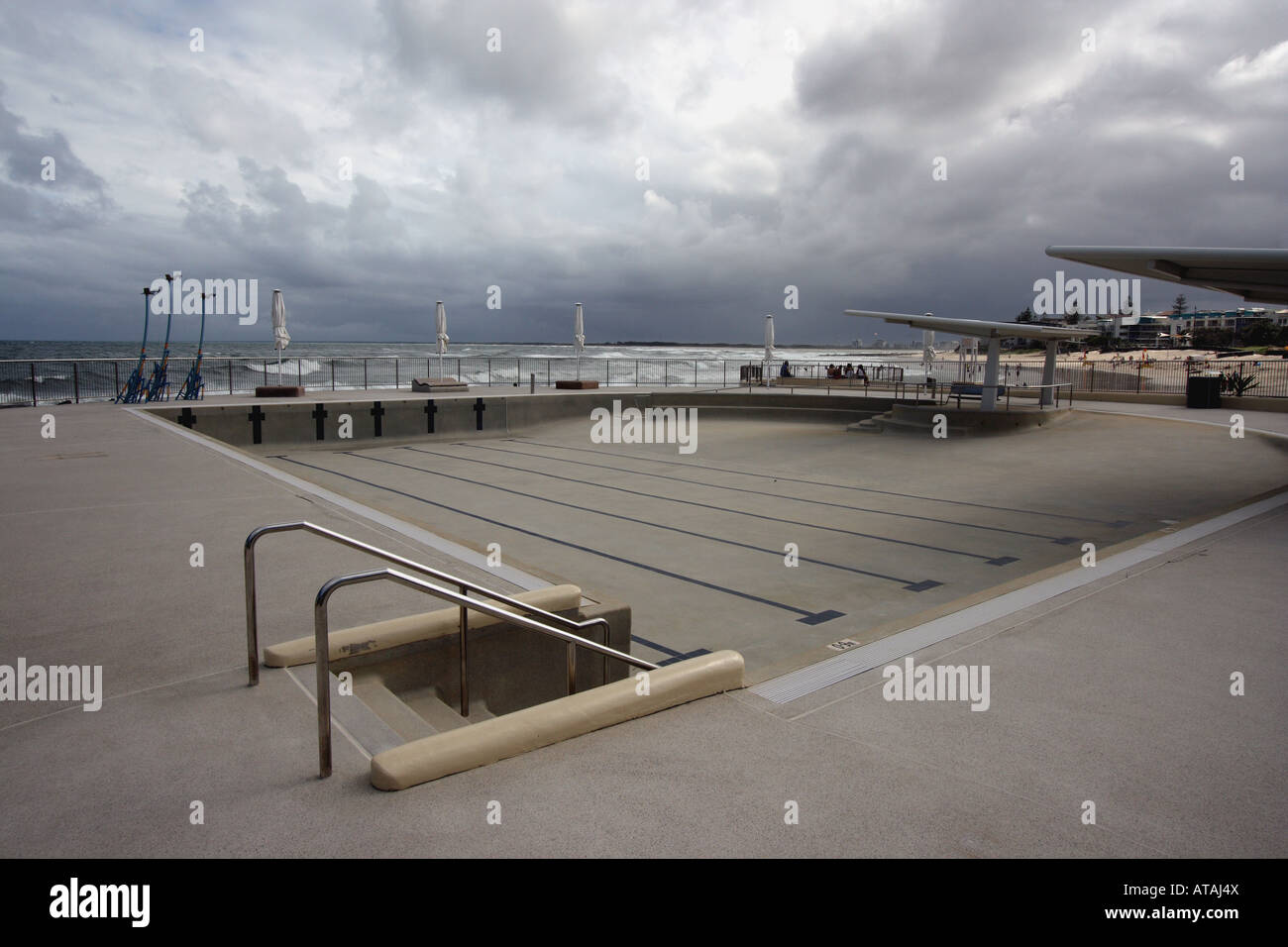 EMPTY PUBLIC SWIMMING POOL WITH STORMY SKY BACKGROUND HORIZONTAL ...