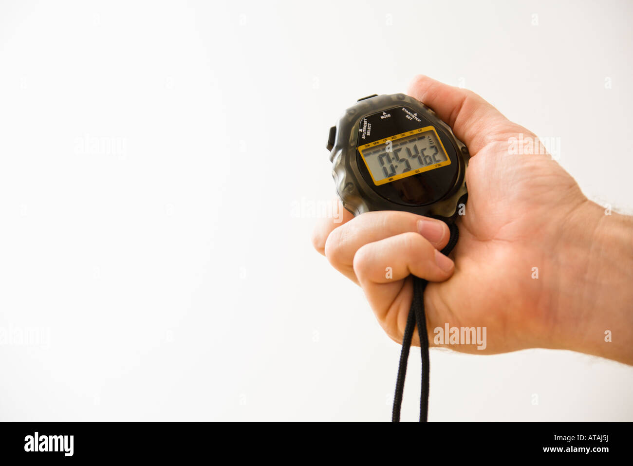 Close up of adult male hand holding stopwatch Stock Photo - Alamy