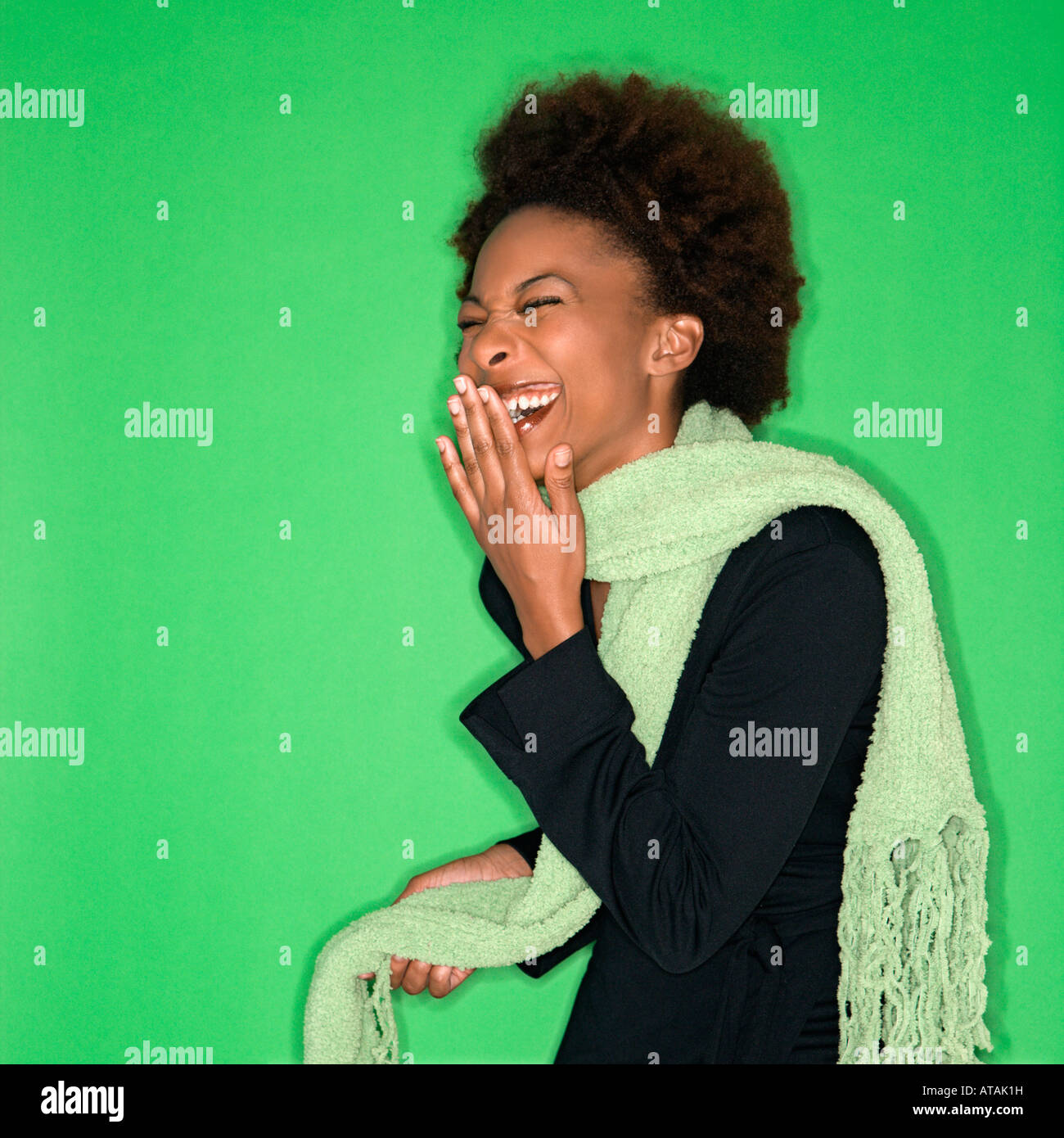 Woman with green scarf hi-res stock photography and images - Alamy