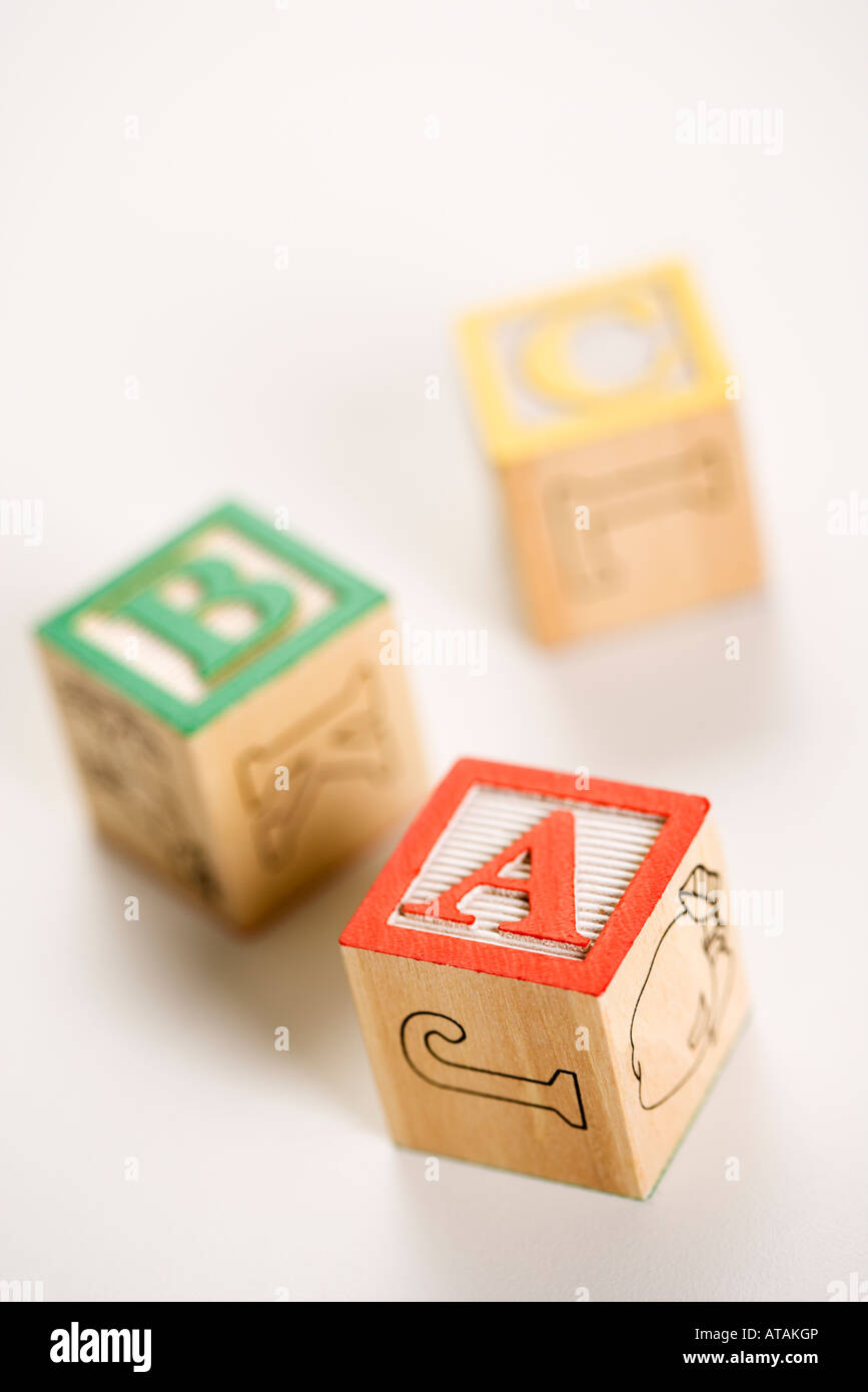 ABC alphabet blocks scattered on white background Stock Photo - Alamy