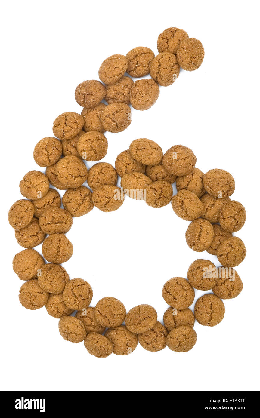 Little ginger nuts in the form of a digit Stock Photo - Alamy