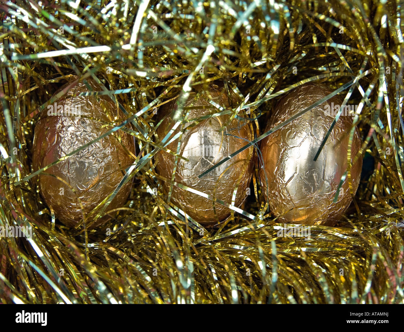Gold foil wrapped easter egg hi-res stock photography and images - Alamy