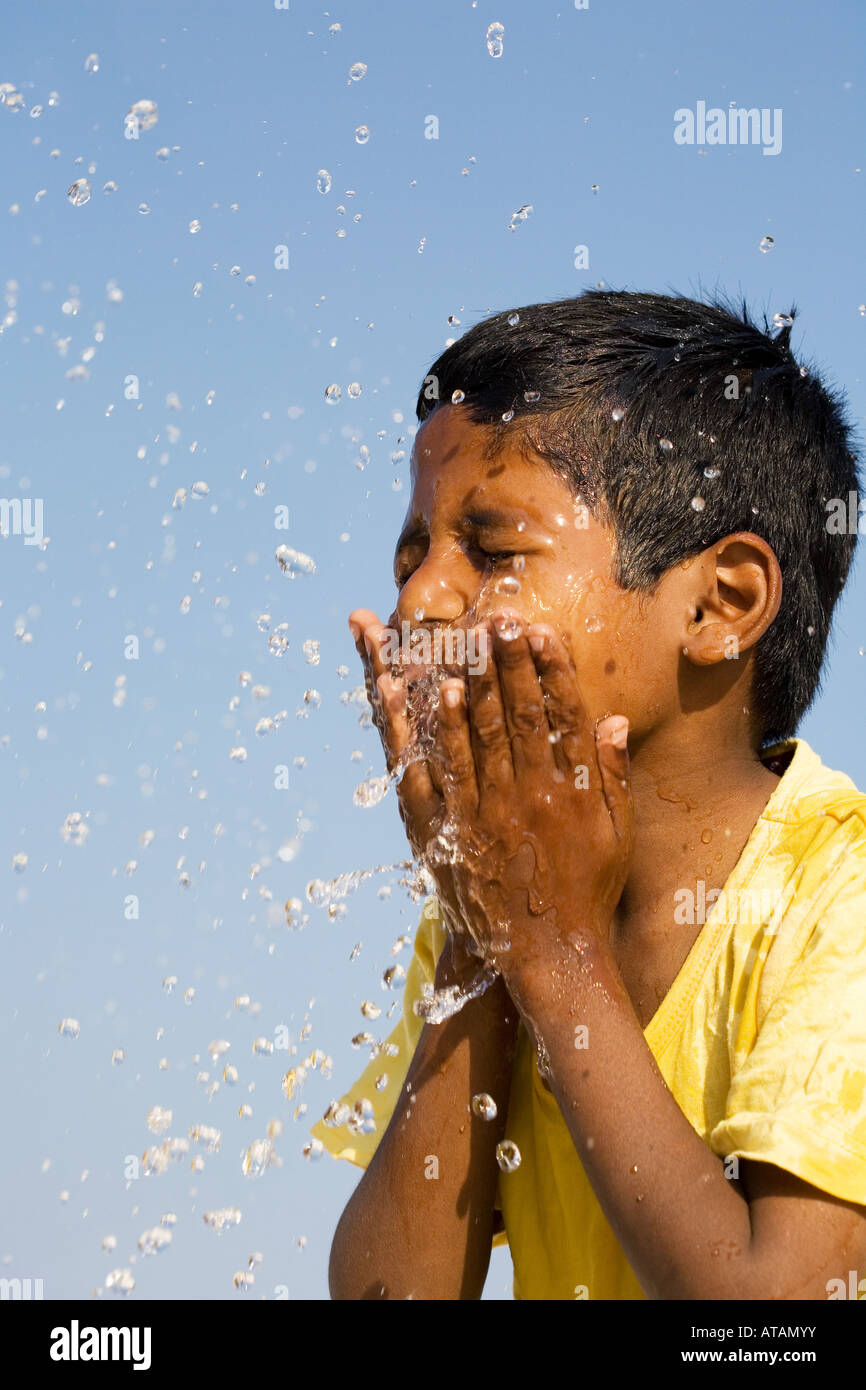 Soaking wet boy hi-res stock photography and images - Alamy