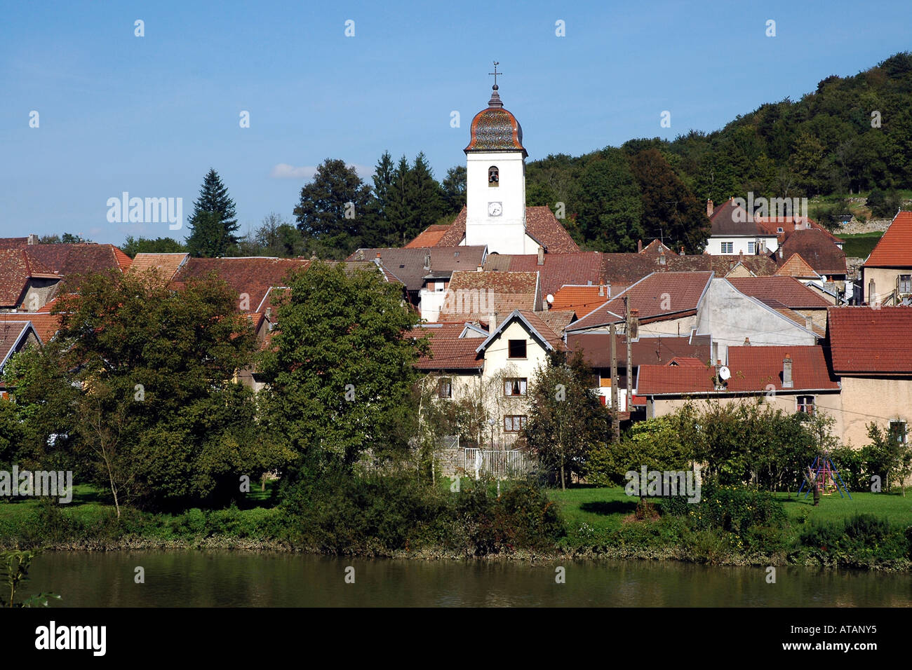 Its tiled belltower is the striking centrepiece of Clerval village on ...