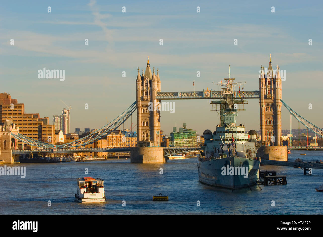 HMS BELFAST and Tower Bridge over River Thames London United Kingdom ...