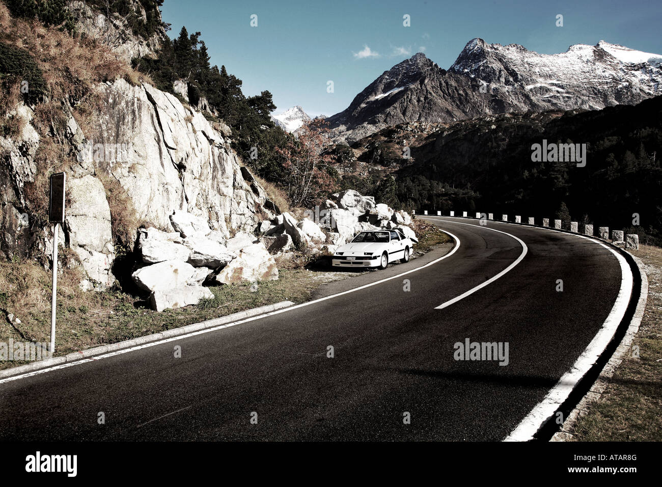 Empty road in Swiss with a parked car aside Stock Photo - Alamy
