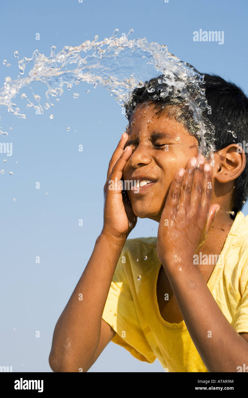 Soaking wet boy hi-res stock photography and images - Alamy