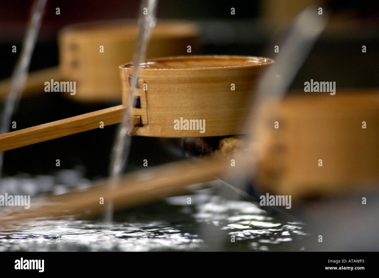 Bamboo water ladles at a spring at Yasaka Shrine Kyoto Japan Stock ...