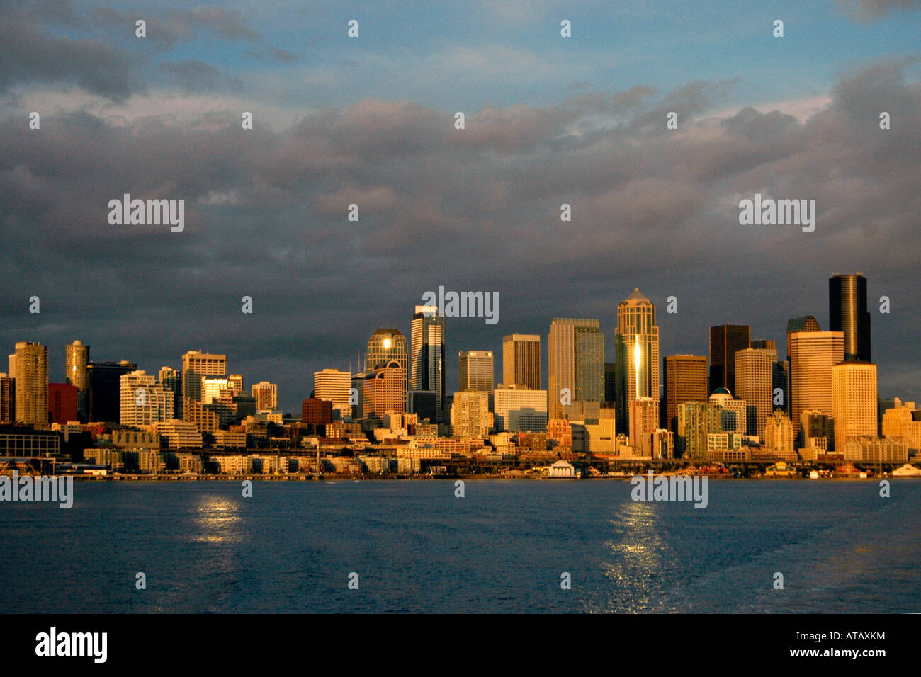 Seattle skyline at sunset from Puget Sound ferry Stock Photo - Alamy