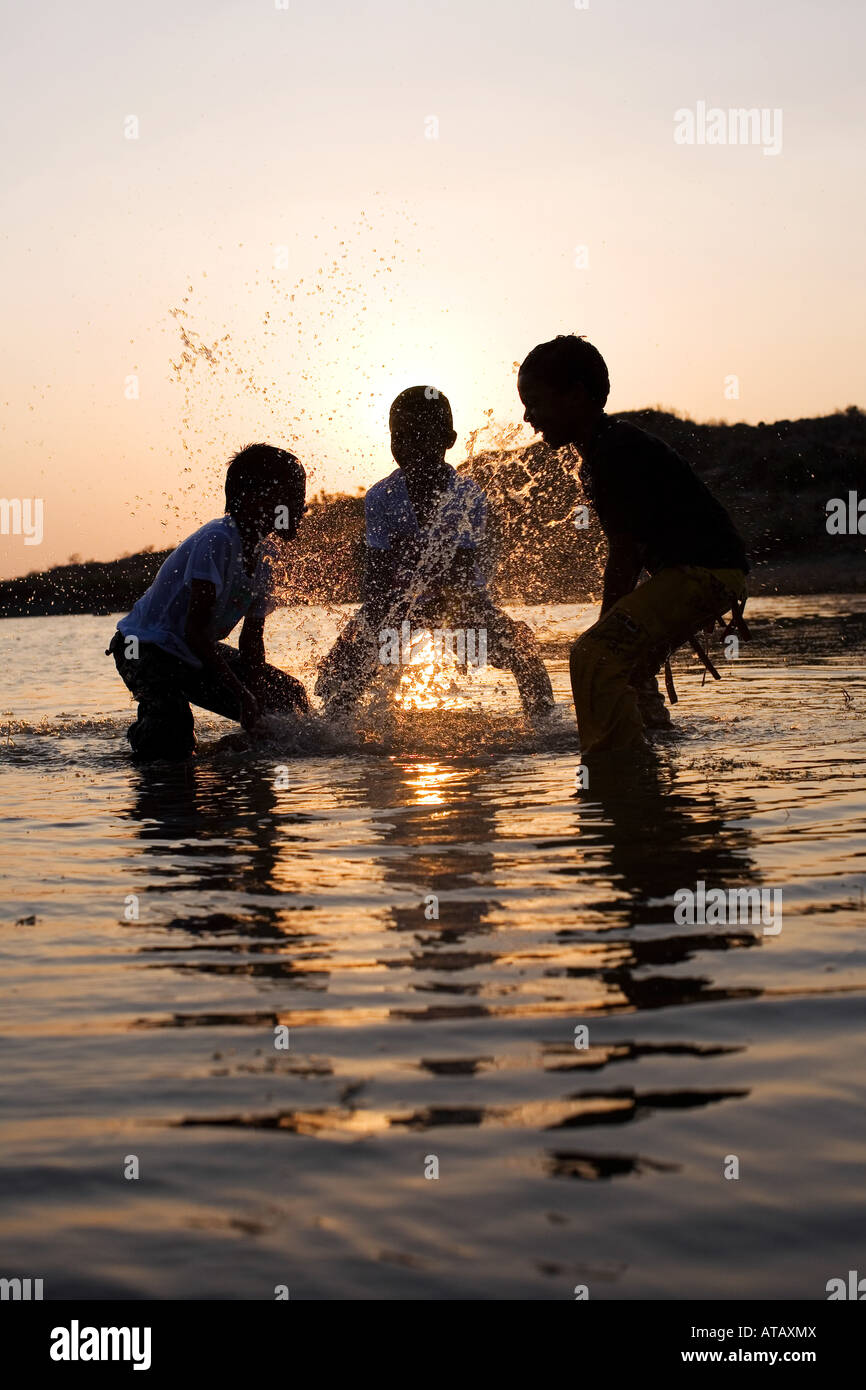 Group of boys having a shower hi-res stock photography and images - Alamy