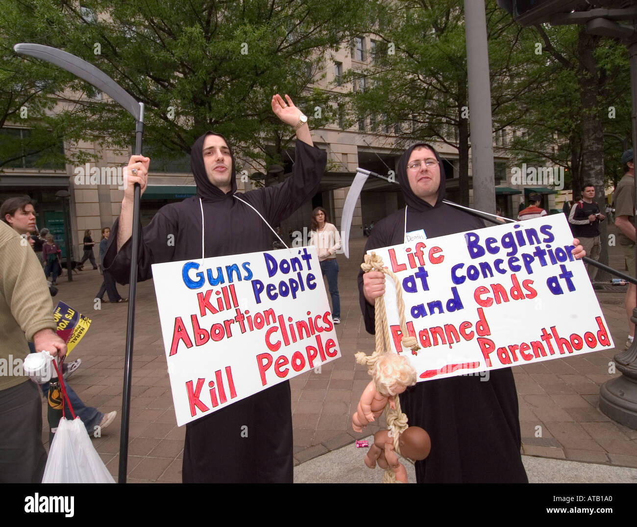 Two pro life demonstrators mock feminist protesters at the March for ...