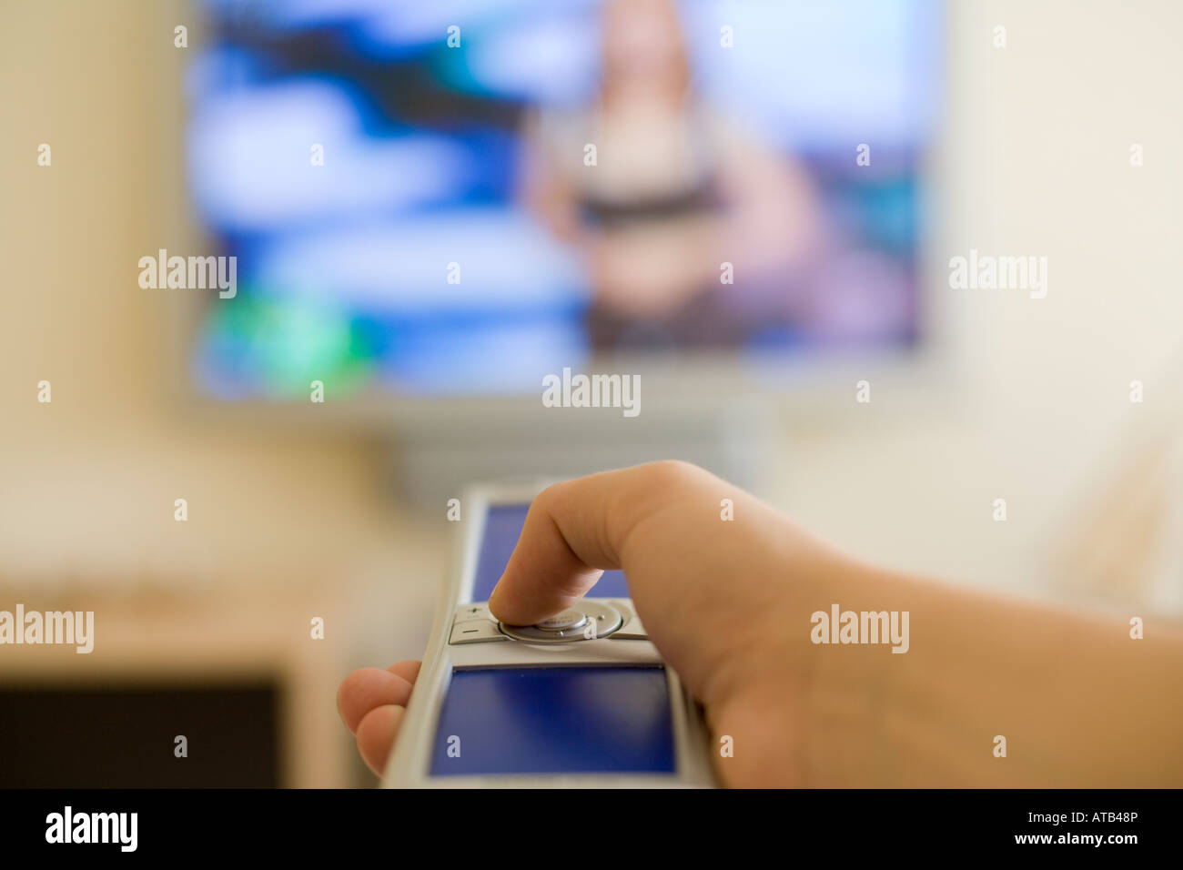 detail of a human hand with a tv remote choosing a tv channel Stock ...