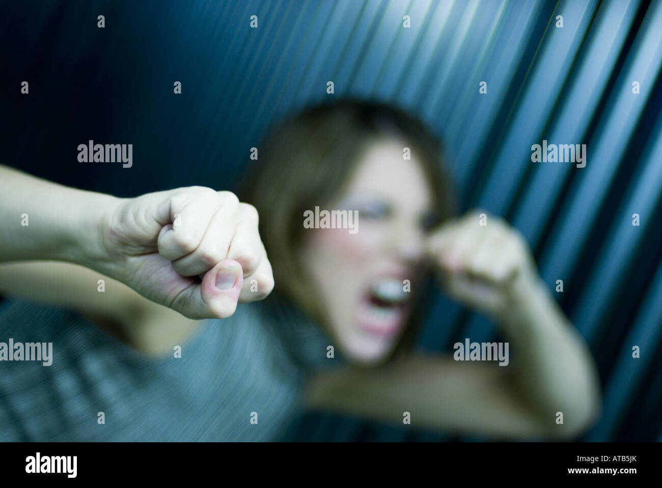 portrait of a woman in agressive pose Stock Photo - Alamy
