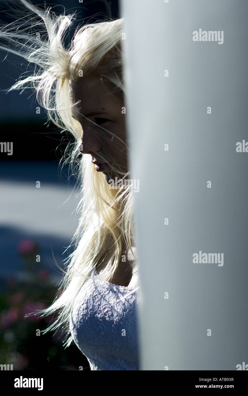profile of a young blond woman in backlight Stock Photo - Alamy