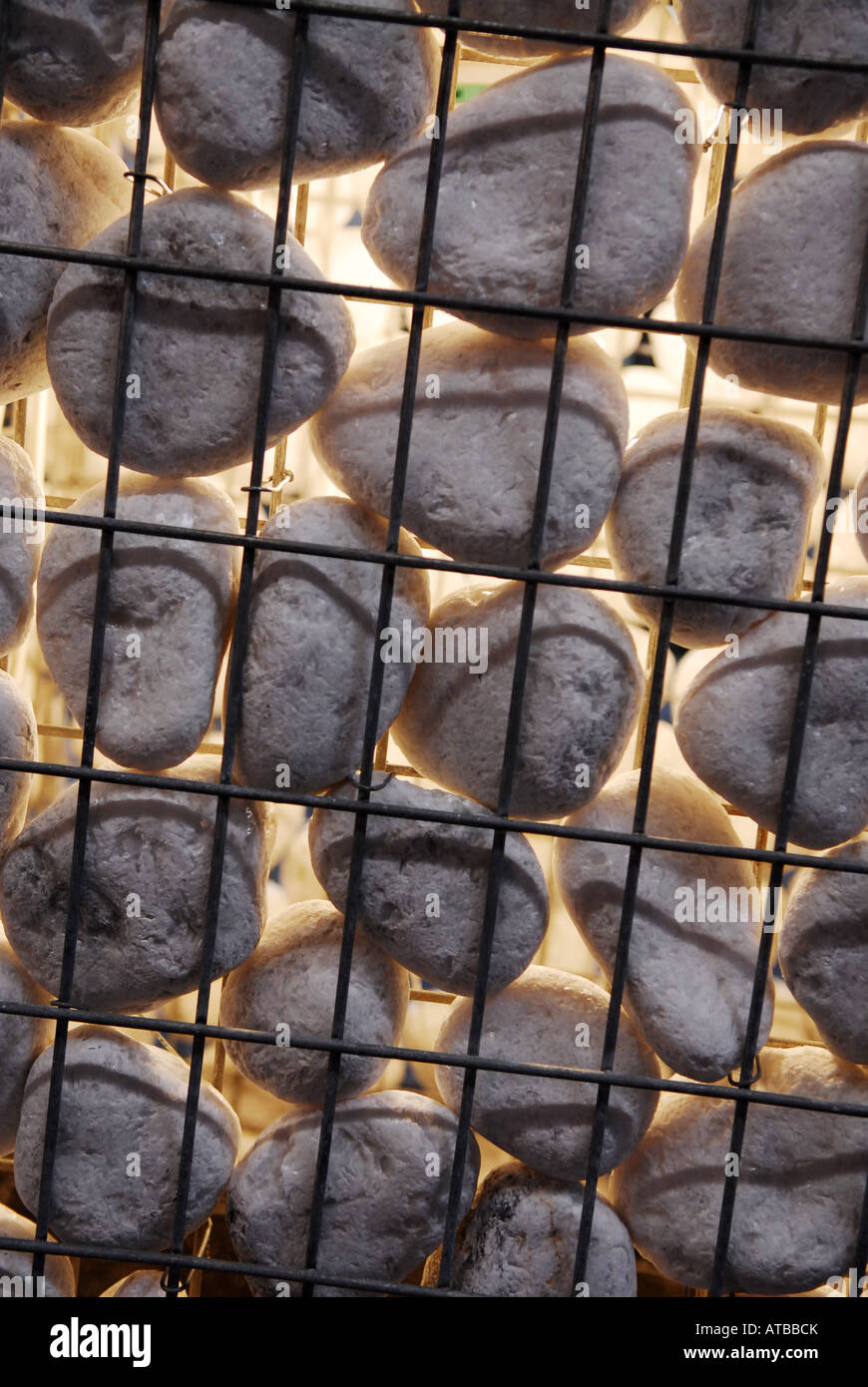 stones, grid basket Stock Photo - Alamy
