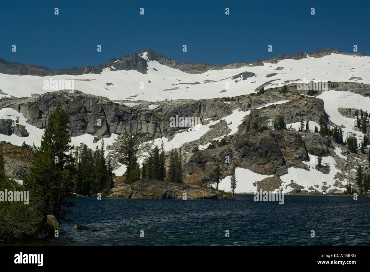 Summer snowfield on mountains above Heather Lake Desolation Wilderness ...