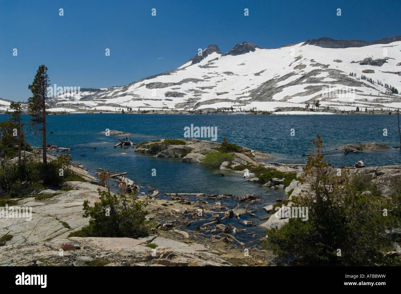 Summer snowfields and mountains above Lake Aloha Desolation Wilderness ...