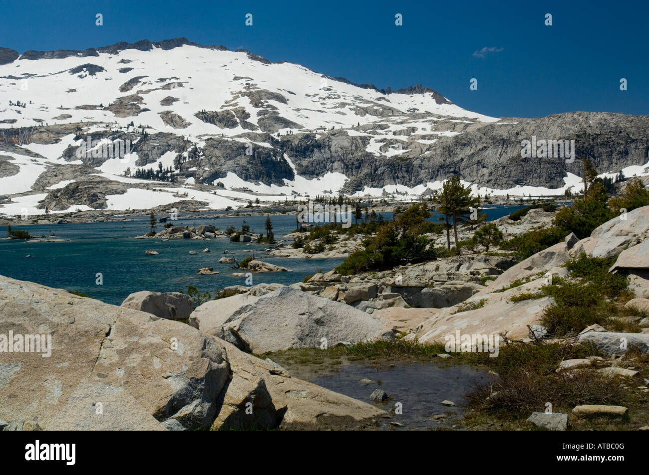 Summer snowfields and mountains above Lake Aloha Desolation Wilderness ...