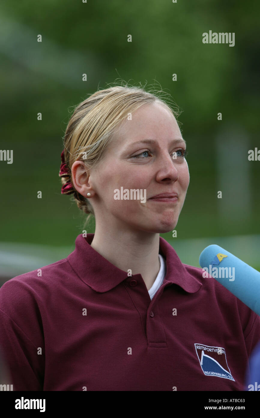 Portrait up of a happy young lady interviewed after a successful ...