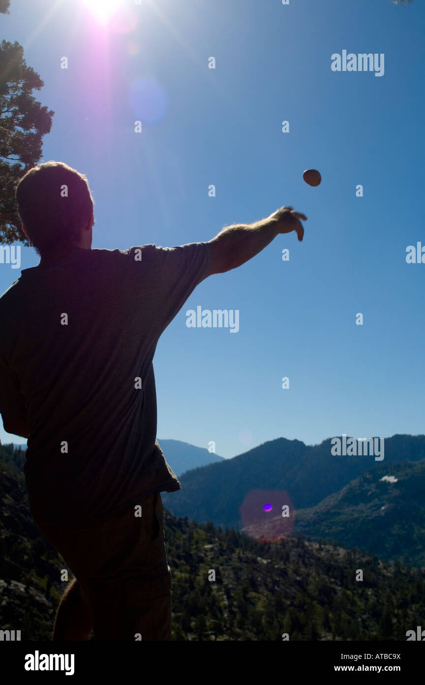 Person throwing a rock Desolation Wilderness El Dorado National Forest ...