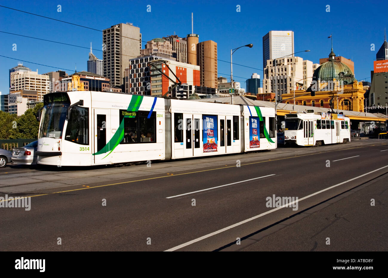 Melbourne Australia / Melbourne trams travel along a city street in ...