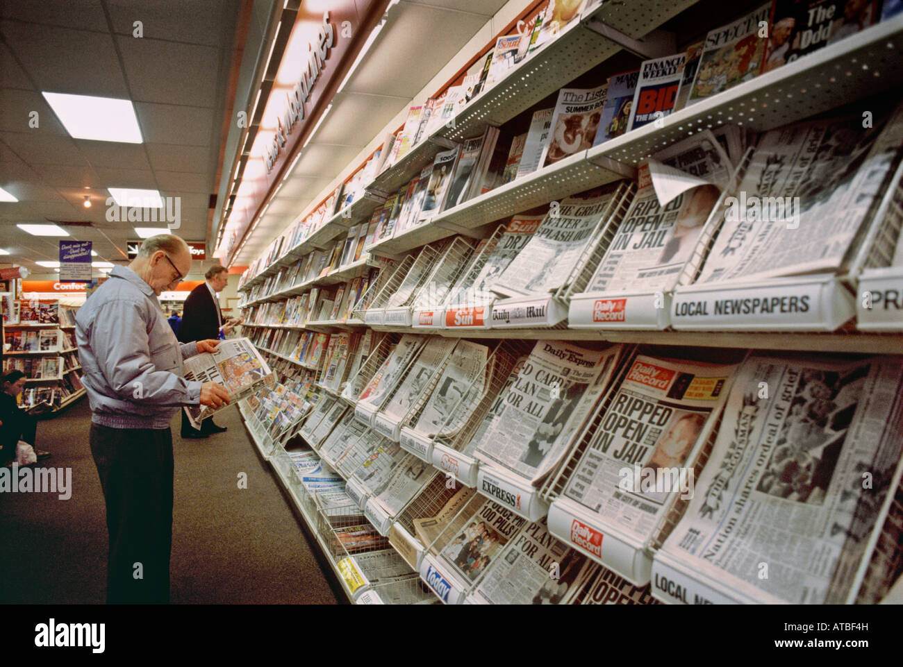 Interior magazine display of Large Newsagent Stock Photo - Alamy