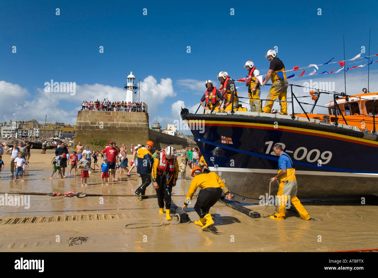 the lifeboat returning to st ives lifeboat day summer Stock Photo - Alamy