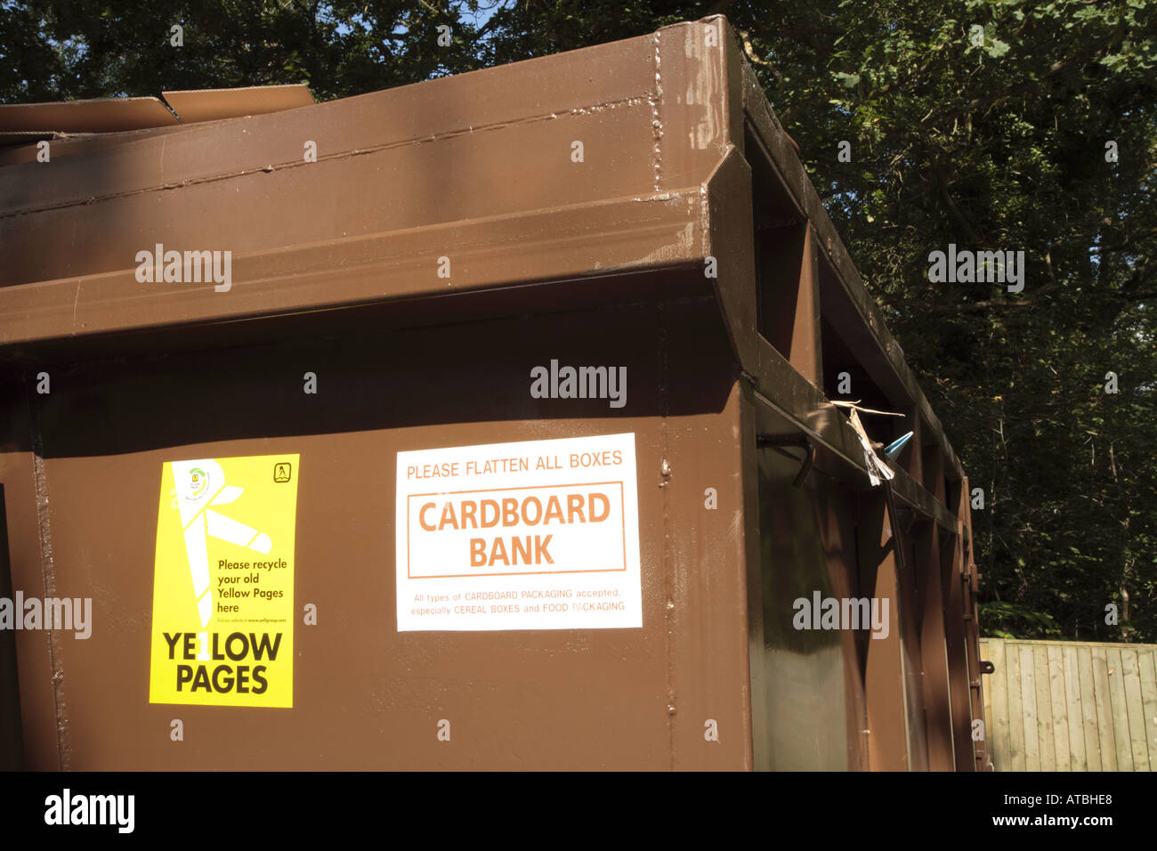 Cardboard recycling bank Stock Photo - Alamy