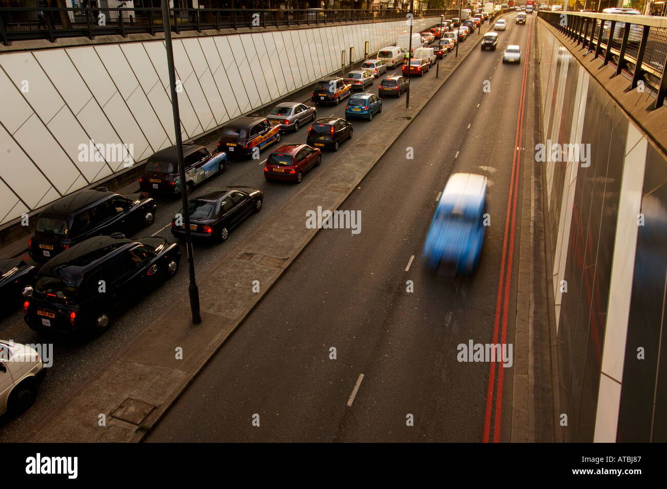 euston underpass with traffic stationary in one direction and cars ...
