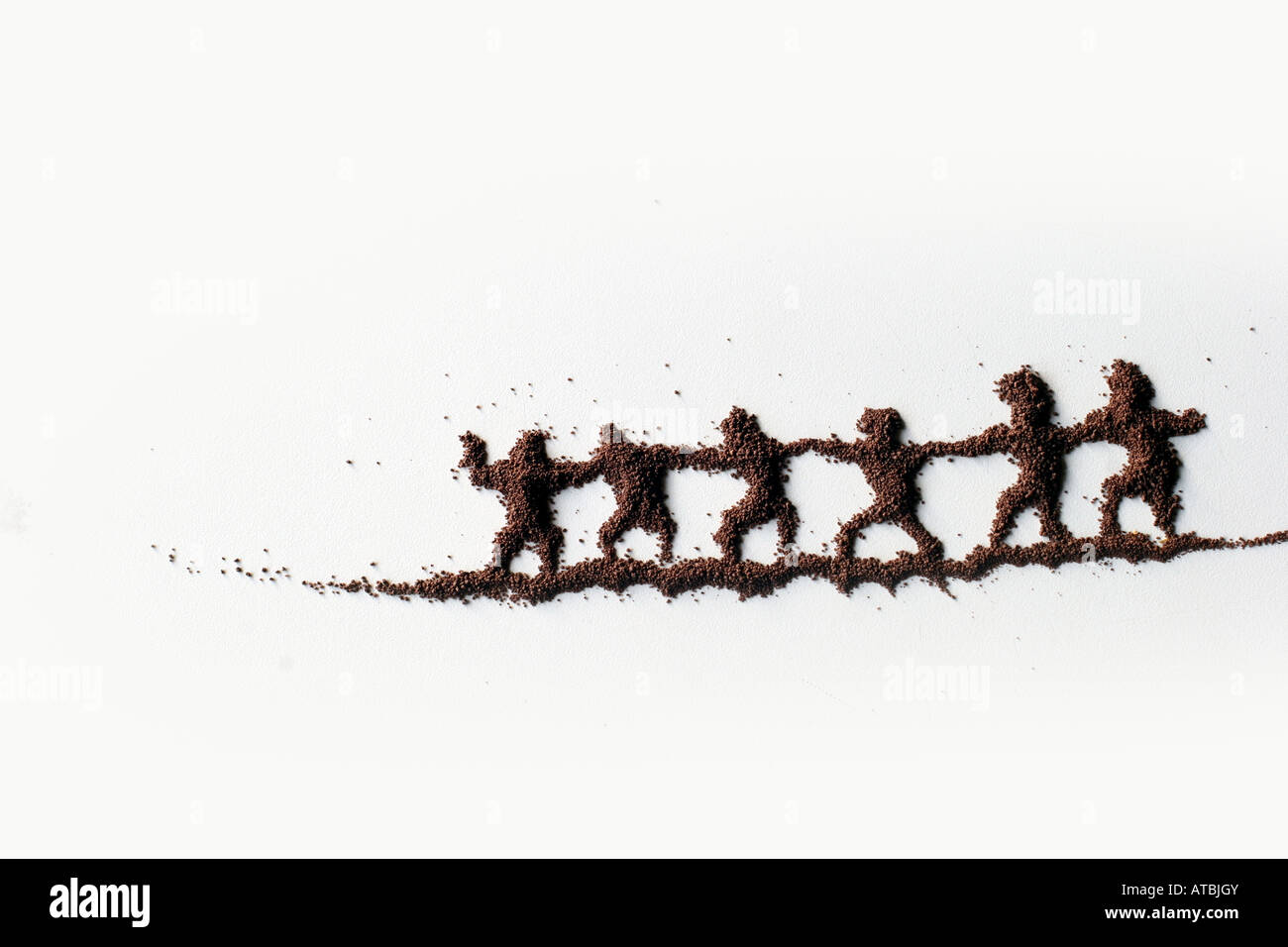 small figures of man made in chocolate powder Stock Photo - Alamy
