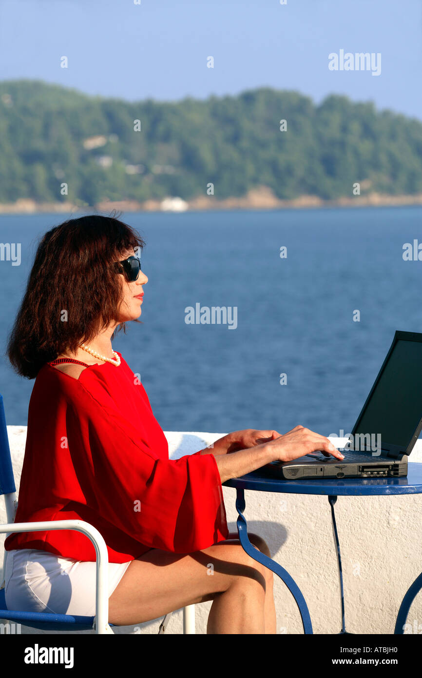 Woman typing on dell laptop hi-res stock photography and images - Alamy