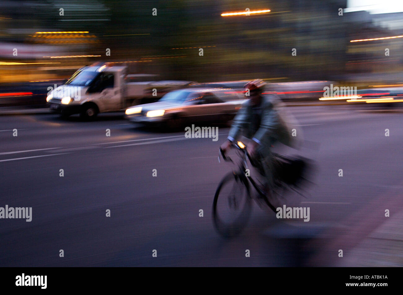 car van and cyclist on the euston road with motion blur to show ...