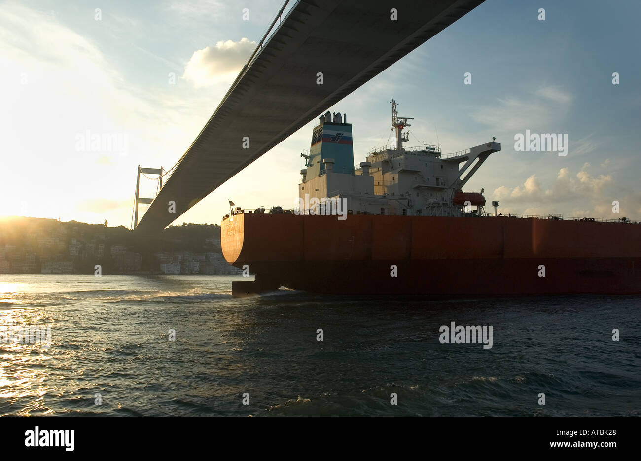 A cargo ship motors through the narrowest part of the Bosphorus under ...