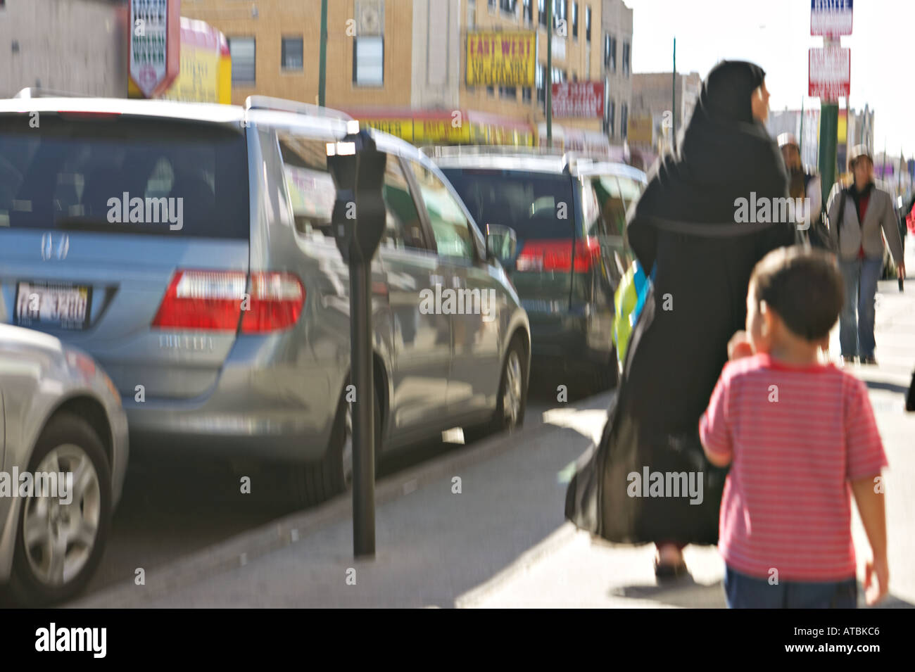 STREET SCENE Chicago Illinois Muslim woman observing hijab walk with ...