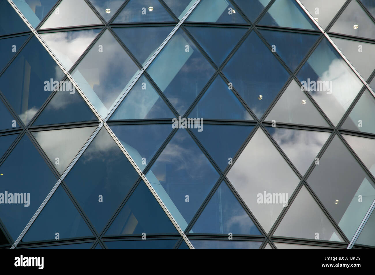 detail of the swiss re (The Gerkin) buildings triangular glass panels ...