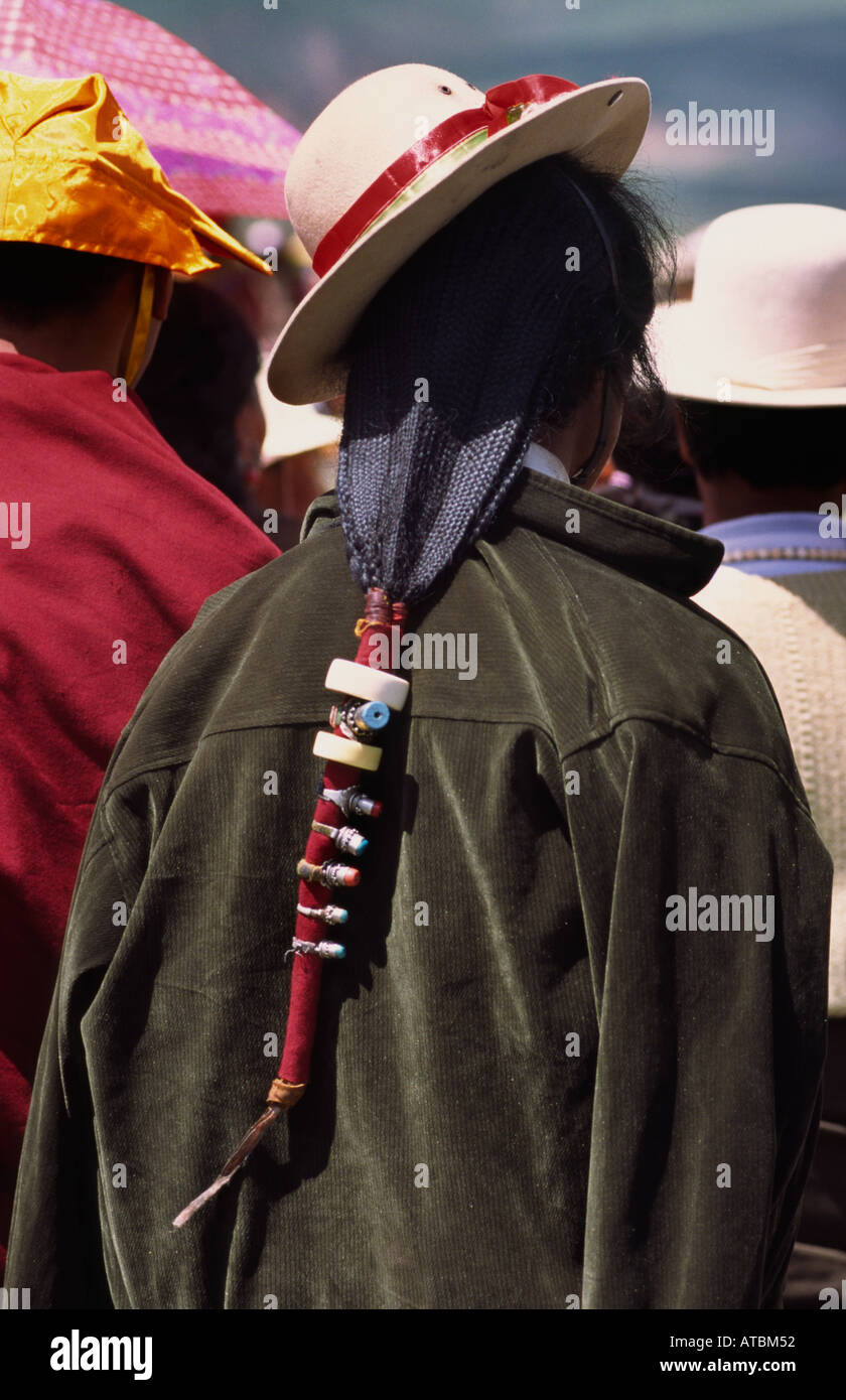 Kham man with braided hair. Litang, Sichuan, China Stock Photo - Alamy