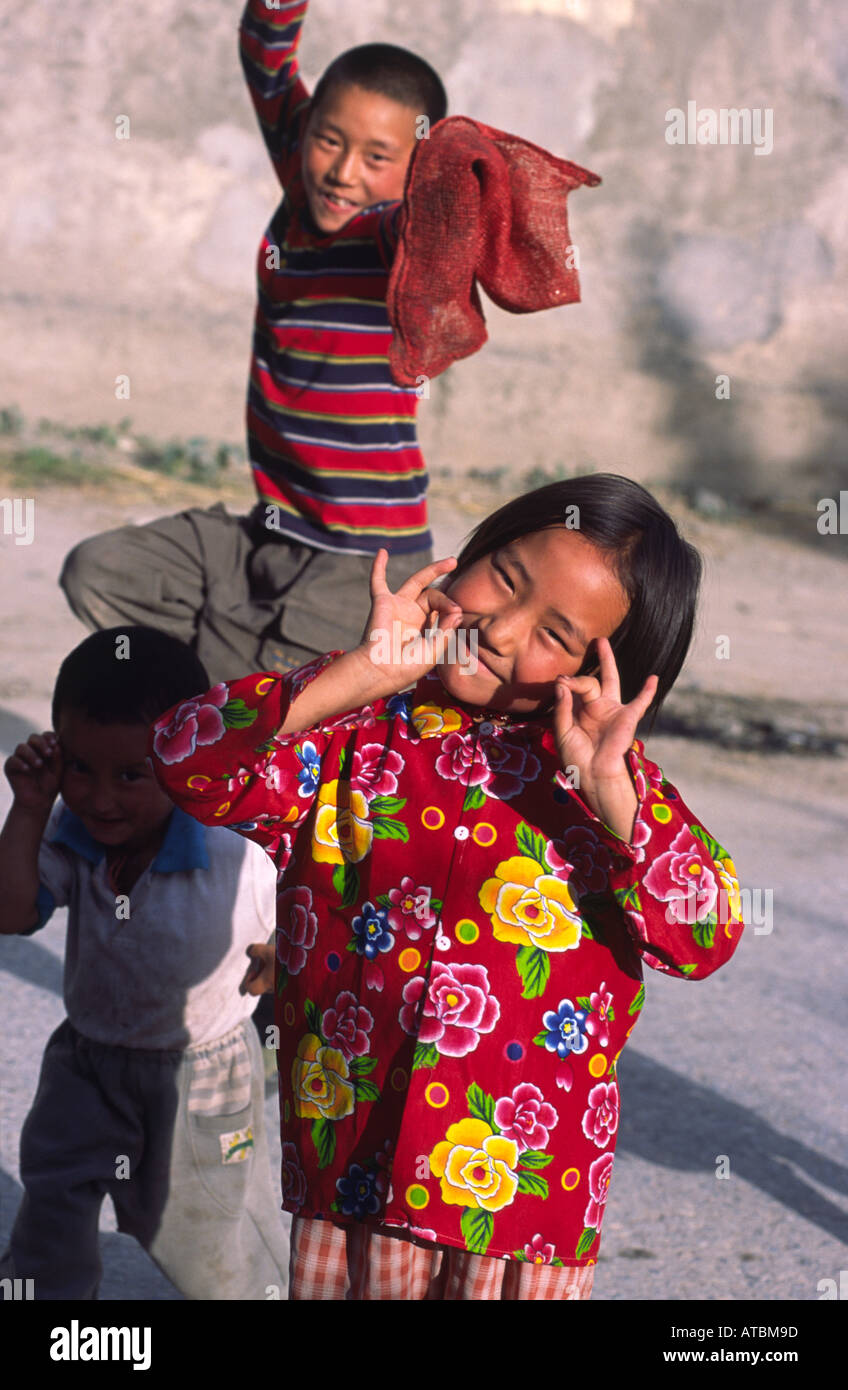 Chinese kids posing for the Camera. Litang, Sichuan, China Stock Photo ...